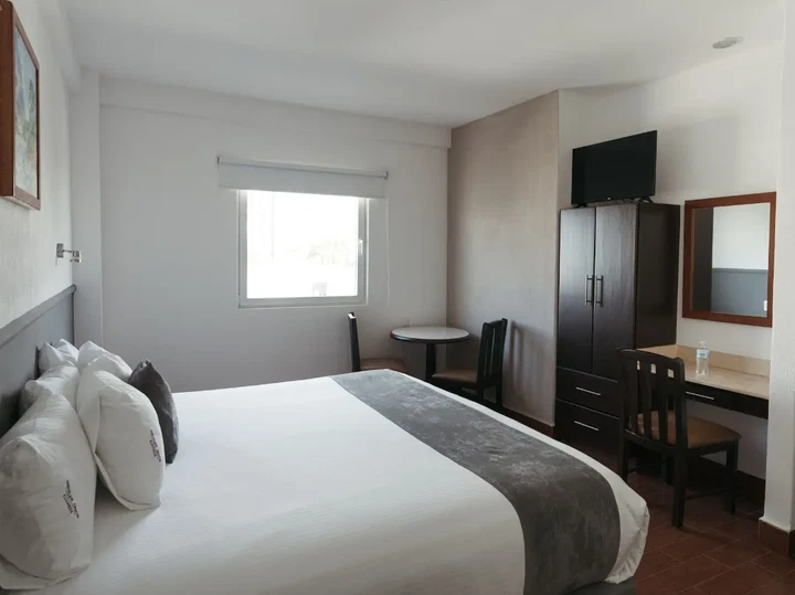 Hoteles ÚNico Express - León