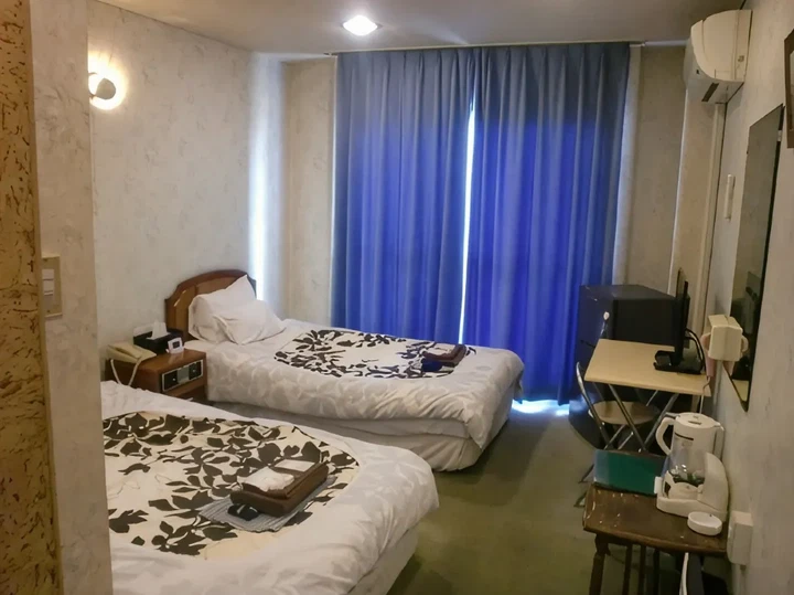Obama Business Hotel - Unzen