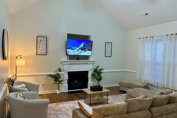 Backyard Retreat: Swing, Grill & Spacious Living - Greenville, NC