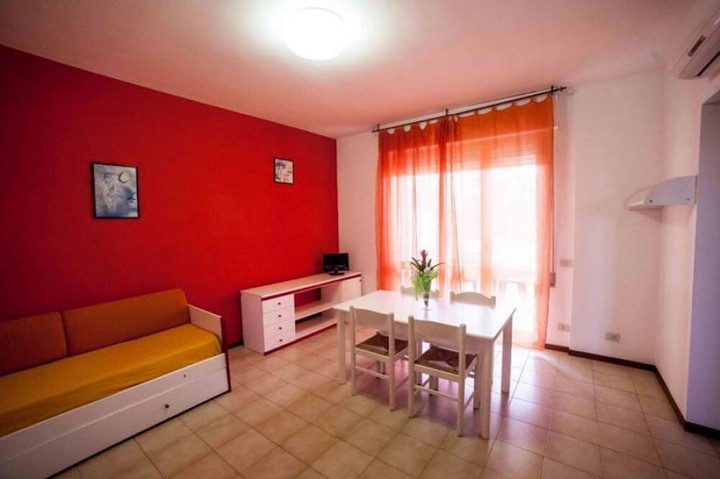 Two-room Apartment Of 35 Square Meters. Consisting Of A Living Room/dining Area With Equipped Kitchenette And Single Sofa Bed, Double Bedroom, Bathroom With Shower And Private Balcony Complete With Table And Chairs.equipped With:- Air Conditioning/heatin - Carrara