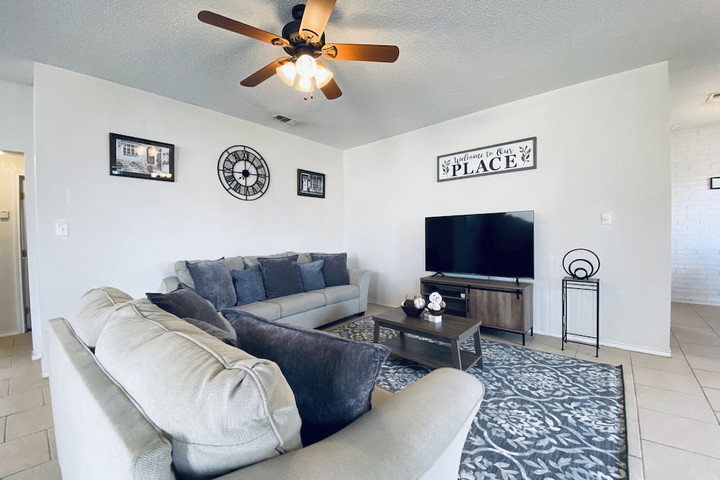 String Light Condo With Chic Brick Interior - Midland, TX