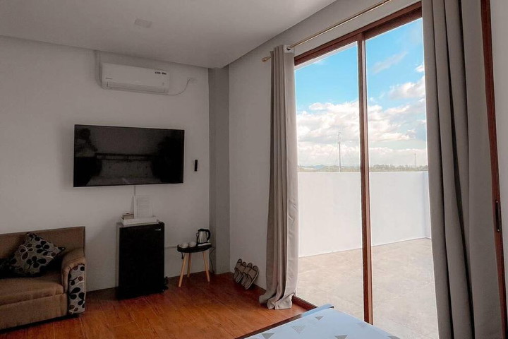Near The Hundred Islands! Spacious-cozy Tropical Vibe Airconditioned Rooms. - Alaminos