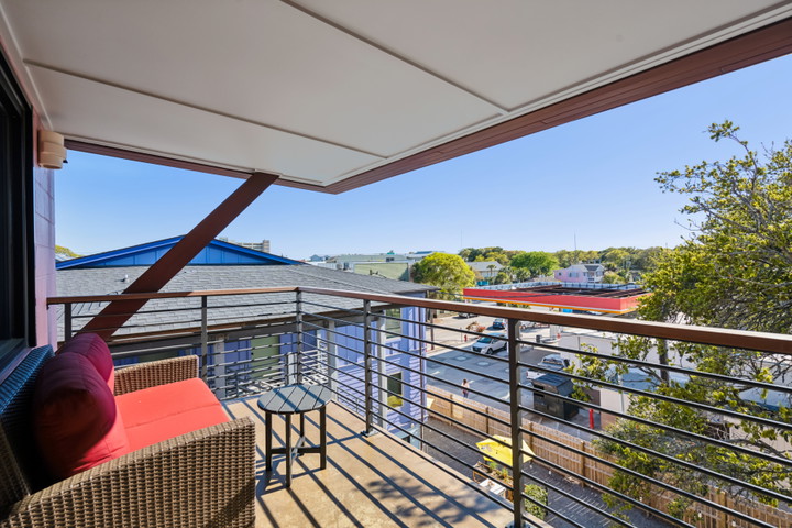 Living Area And Balcony Steps From Center Street - Charming Studio Oasis - United States