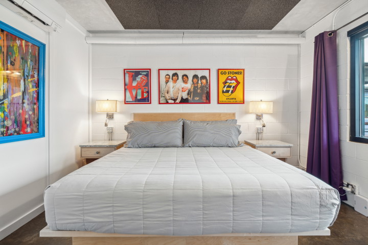 Living Area And Spacious Balcony Near Center Street - Charming Studio Retreat - United States