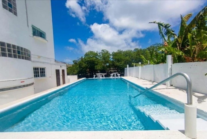 See Belize Waterside Sea View Family Apt For 6 With Kitchen, Balcony, Pool & Overwater Deck Near Airport, Restaurant, Bar & Casino - Belice
