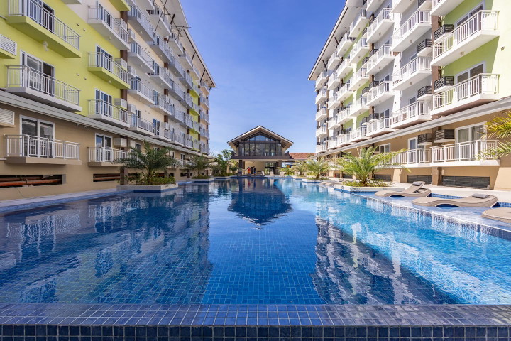 107b Condotel Near Airport &Mall+pool+gym+netflix. - Cebu