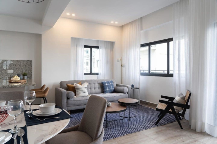 Designer Condo Near Blue Mall With Rooftop Pool And City Views | Yellowkey - Caribbean