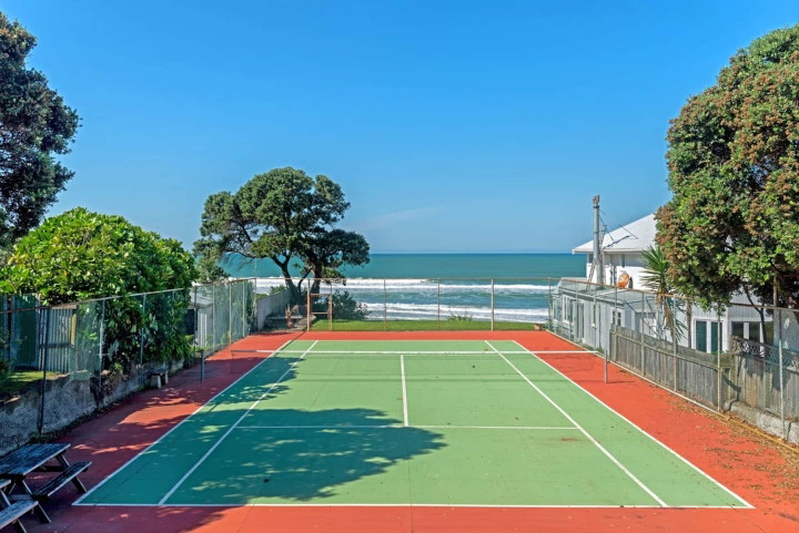 Beachfront Escape With Tennis Court - Gisborne