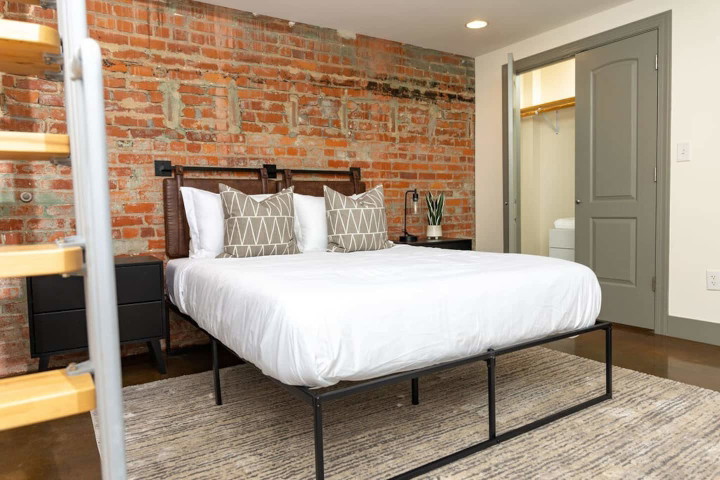 Stay Roanoke | Designer Brick Loft In Downtown - Roanoke, VA