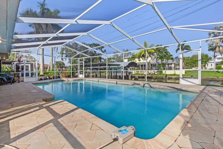 Canalfront Pool Oasis: Private Dock & Sunset Views - Fort Myers, FL