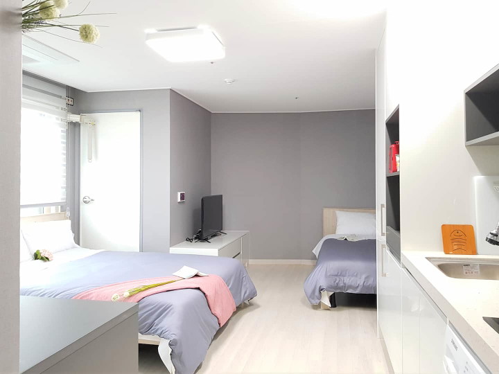 아라팰리스704호(2bed)>공항인근,동문시장 도보10분,취사/세탁가능,city View - Jeju