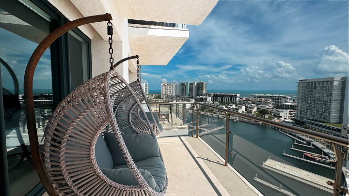 The Caribbean And The Marina From Your Balcony · Top - Isla Mujeres
