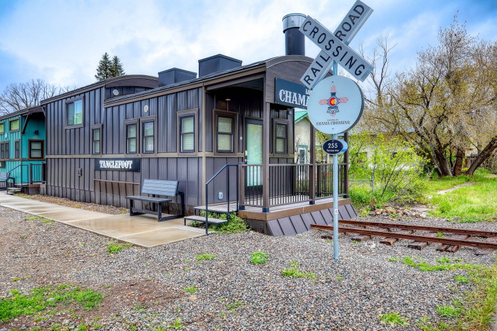Chama Crossing - Tiny Train Next To Railroad - Chama, NM